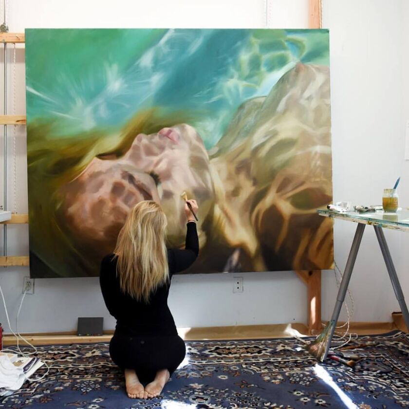 Hyperrealistic underwater paintings of women in a deep state of ...
