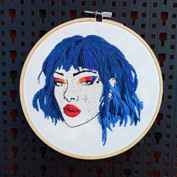 Expressive embroidered portraits composed of colorful lines and ...
