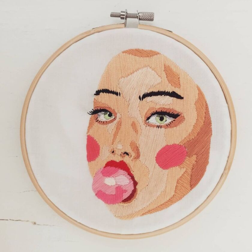 Expressive embroidered portraits composed of colorful lines and ...