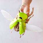 Expressive embroidered portraits composed of colorful lines and ...