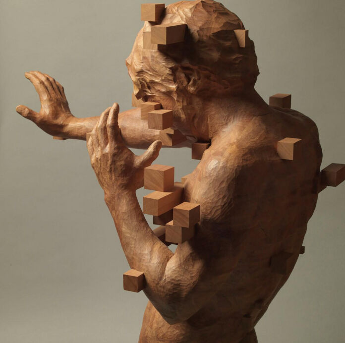 Hsu Tung Han: surreal pixeled figurative wood sculptures