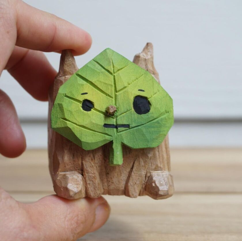 Parn Aniwat: cartoon characters carved from wood