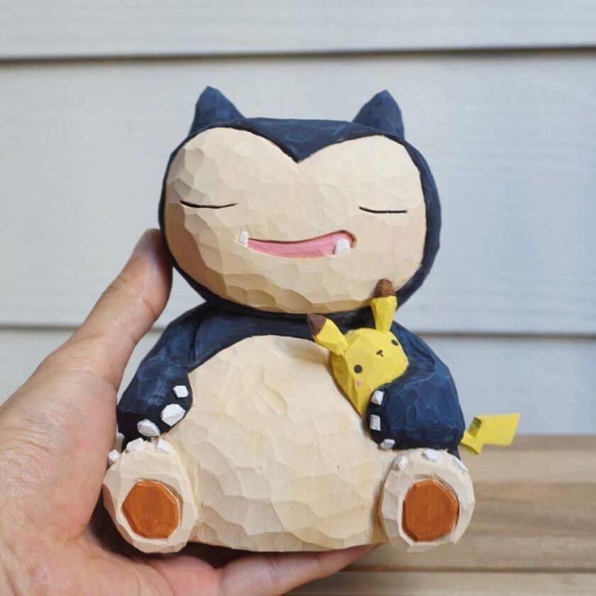 Parn Aniwat: cartoon characters carved from wood