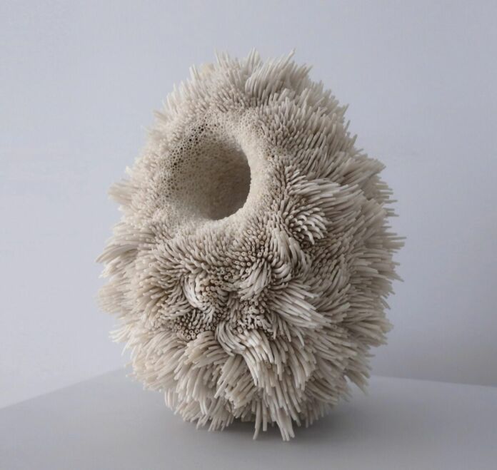 Abstract sculptures made with swirls of seashells by Rowan Mersh ...