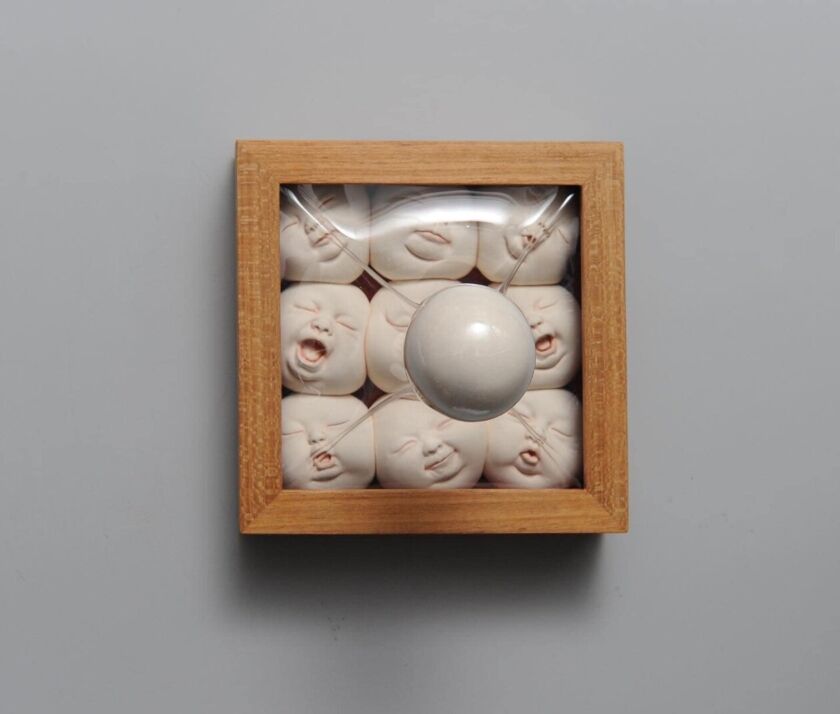 Johnson Tsang: distorted baby face ceramic sculptures