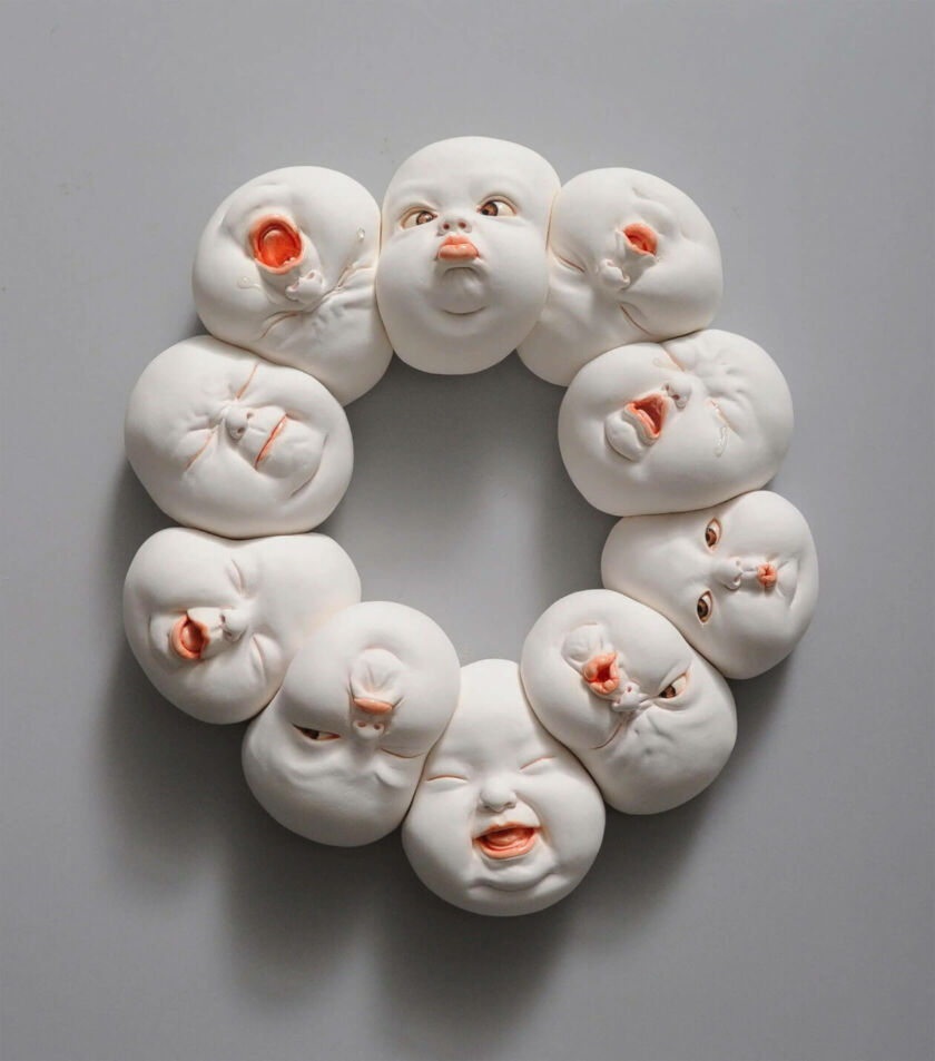Distorted baby faces: surreal and disturbing ceramic sculptures by ...