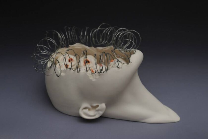 Distorted baby faces: surreal and disturbing ceramic sculptures by ...