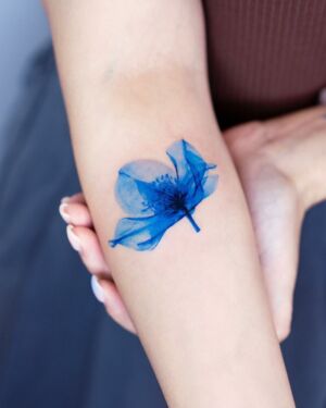 Pokhy: stunningly realistic blue-themed tattoos