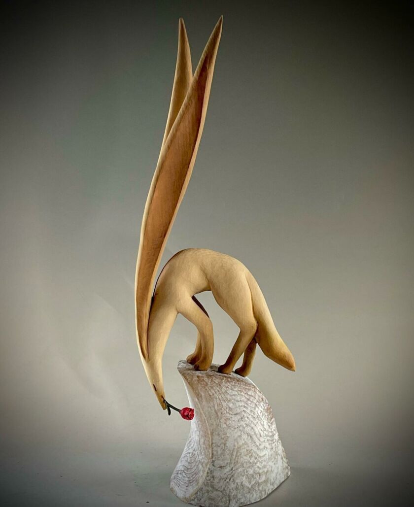 Nikichi: anthropomorphic animal wood grip sculptures