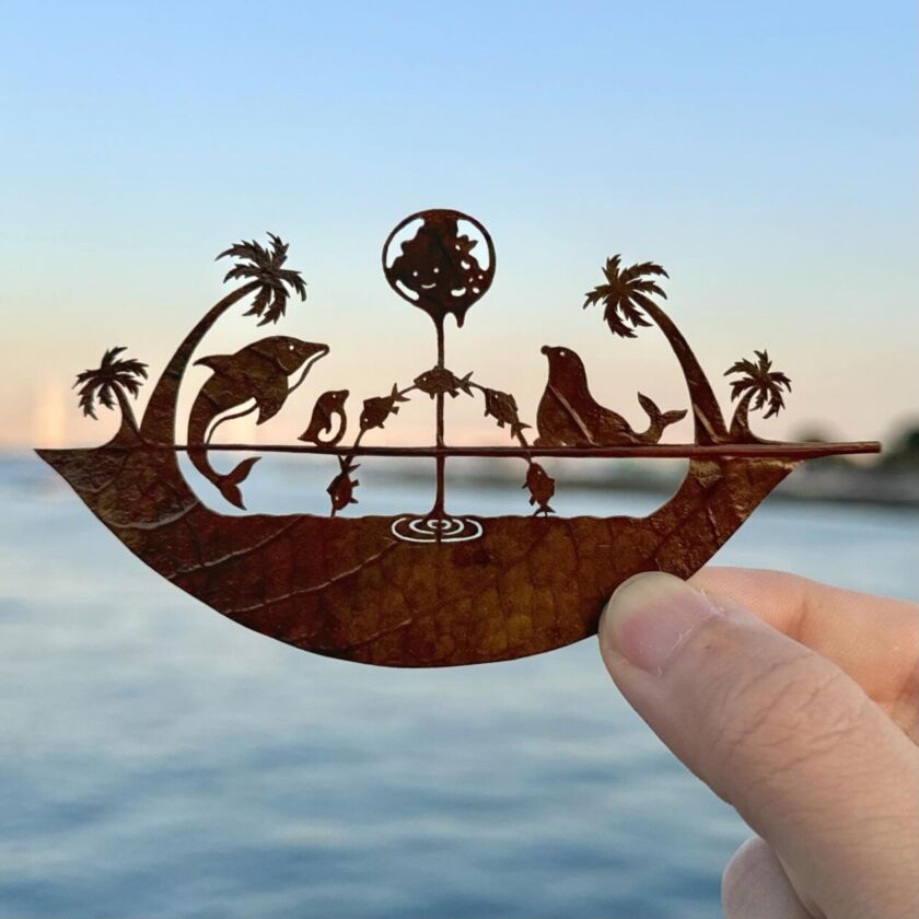 Lito: intricate scenes hand-carved into leaves