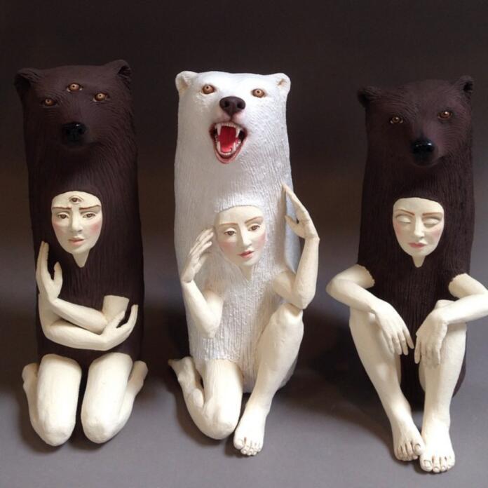 Crystal Morey: people encased in endangered animal ceramic sculptures